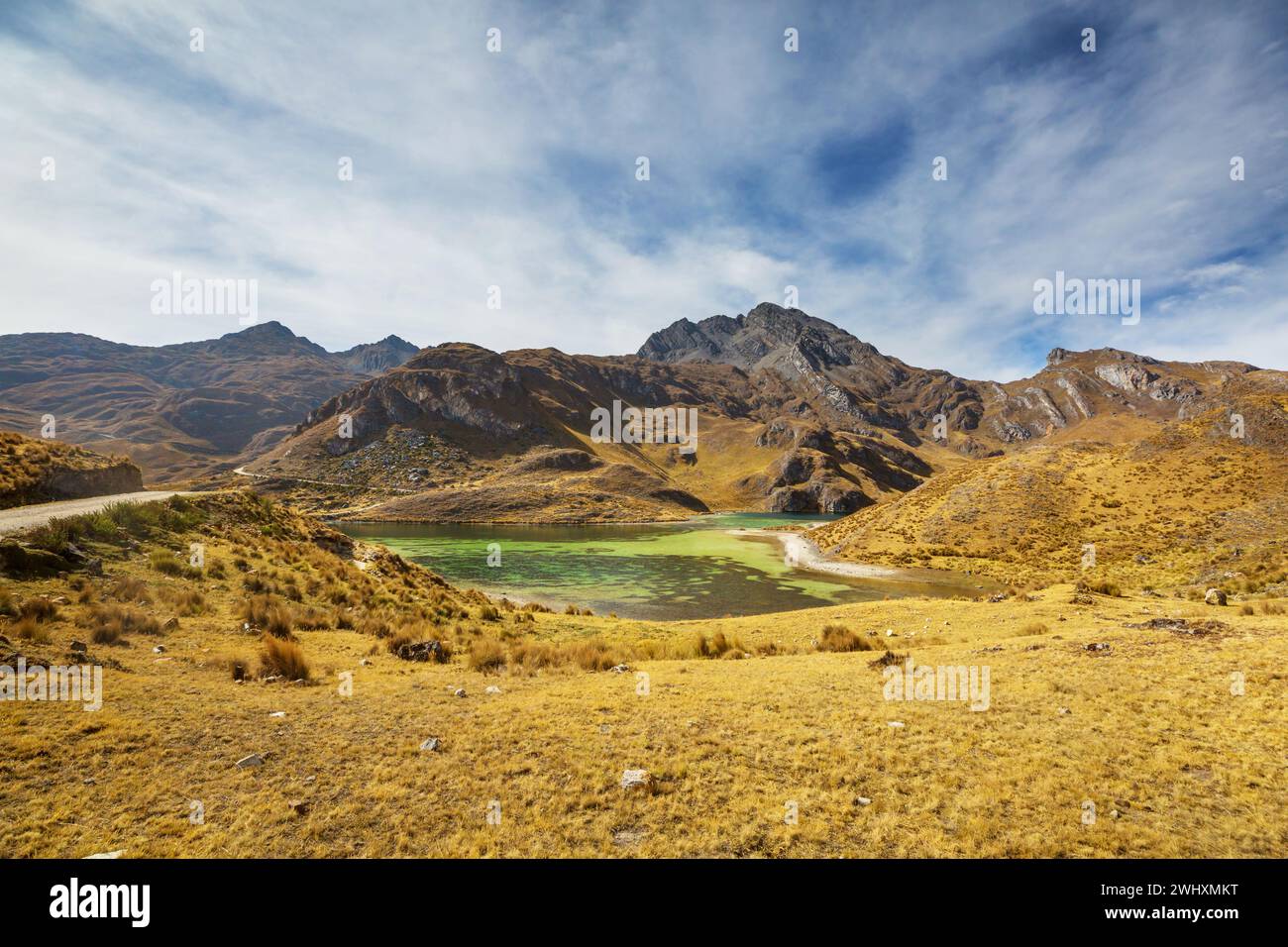 Hiking in the fantastic landscape of the Peruvian high mountain Andes ...