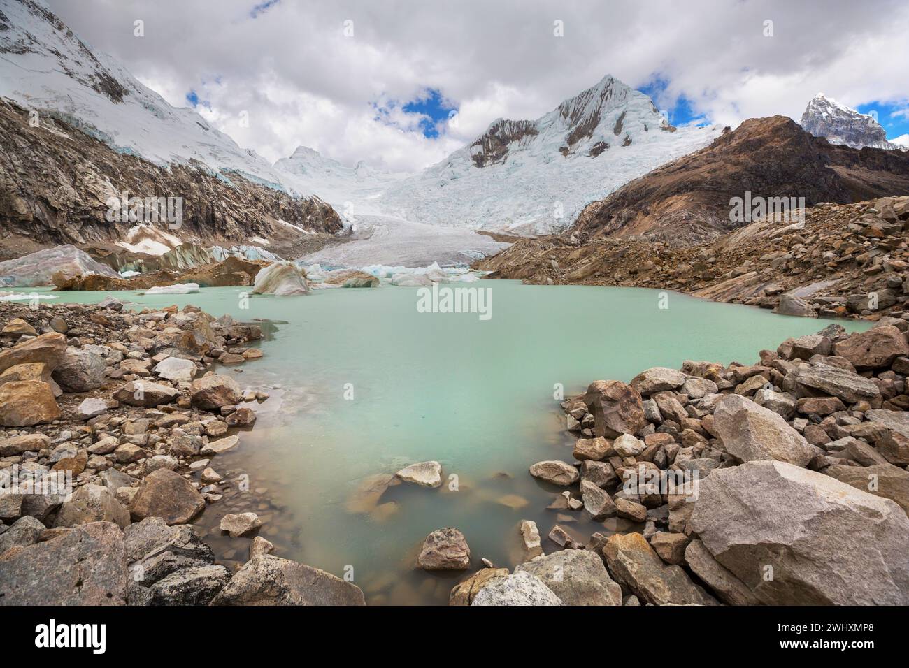 Hiking in the fantastic landscape of the Peruvian high mountain Andes ...
