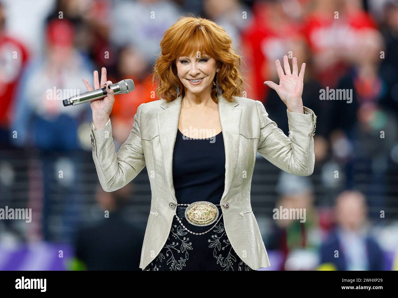 Country music icon and Grammy Award winner Reba McEntire sings the national anthem during the ...