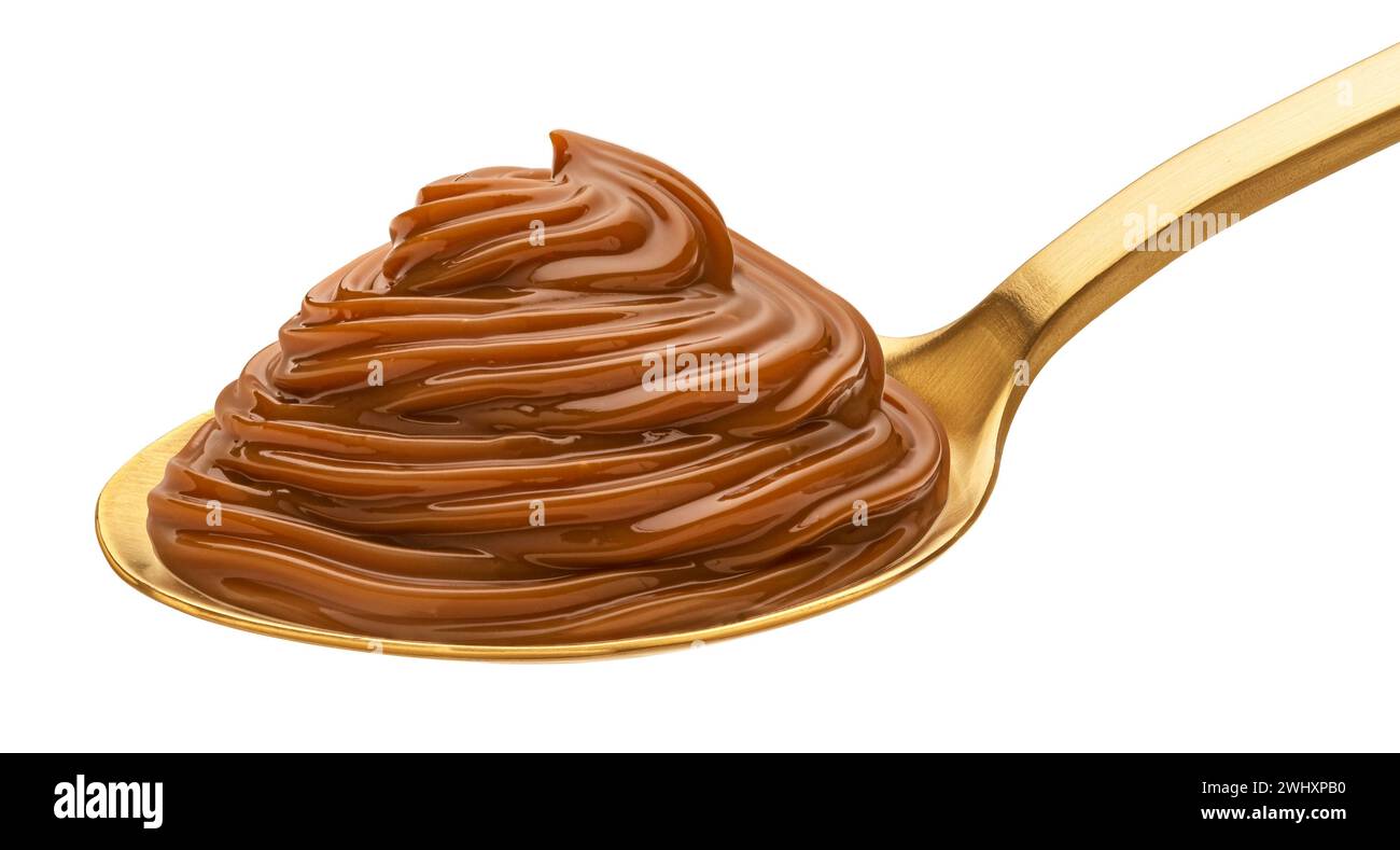 Caramel cream, boiled condensed milk swirl in spoon isolated Stock ...