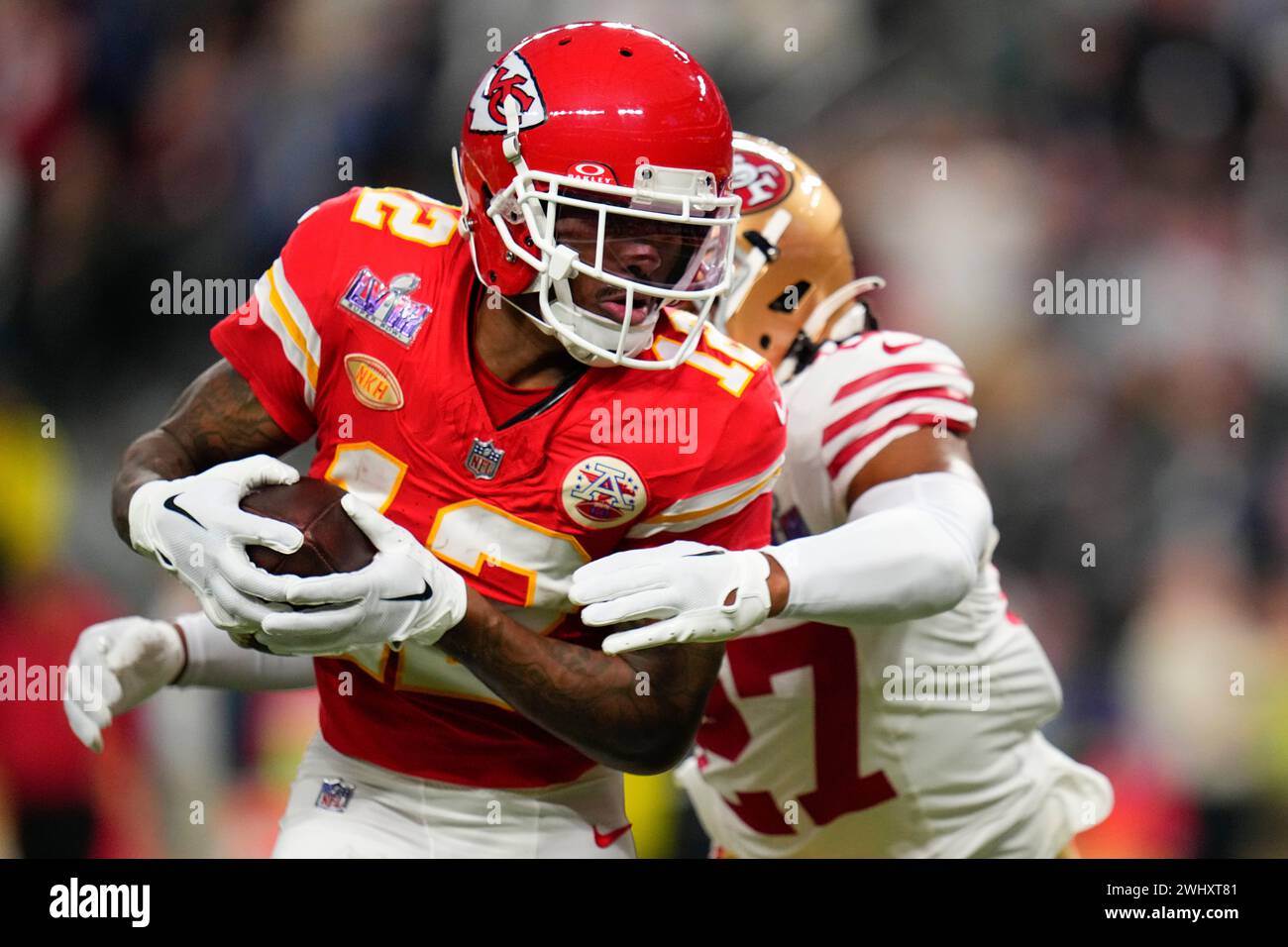 Kansas City Chiefs wide receiver Mecole Hardman Jr. (12) is tackled by ...