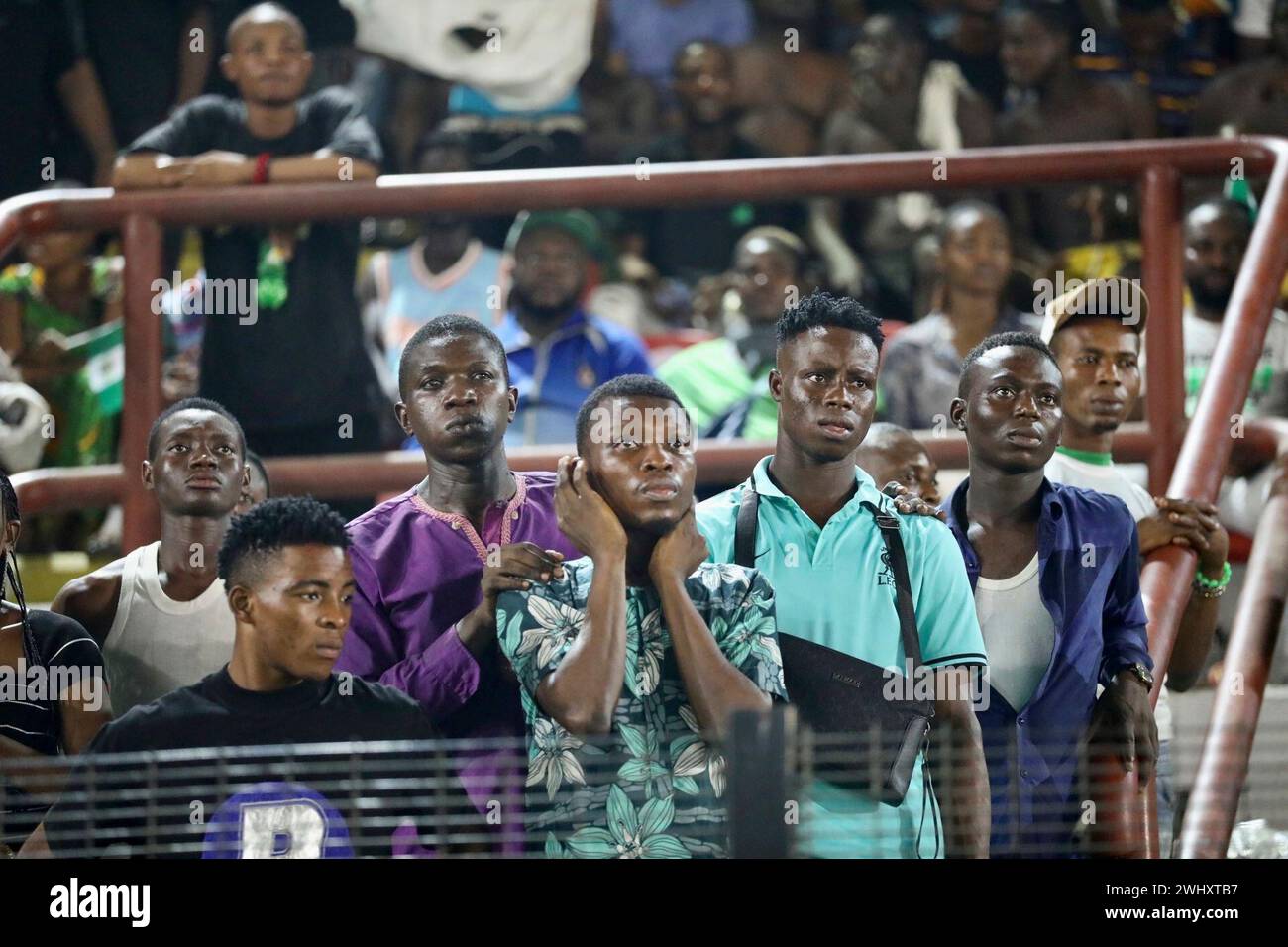 Nigerian fans react in a Lagos fan zone to their team losing during an ...
