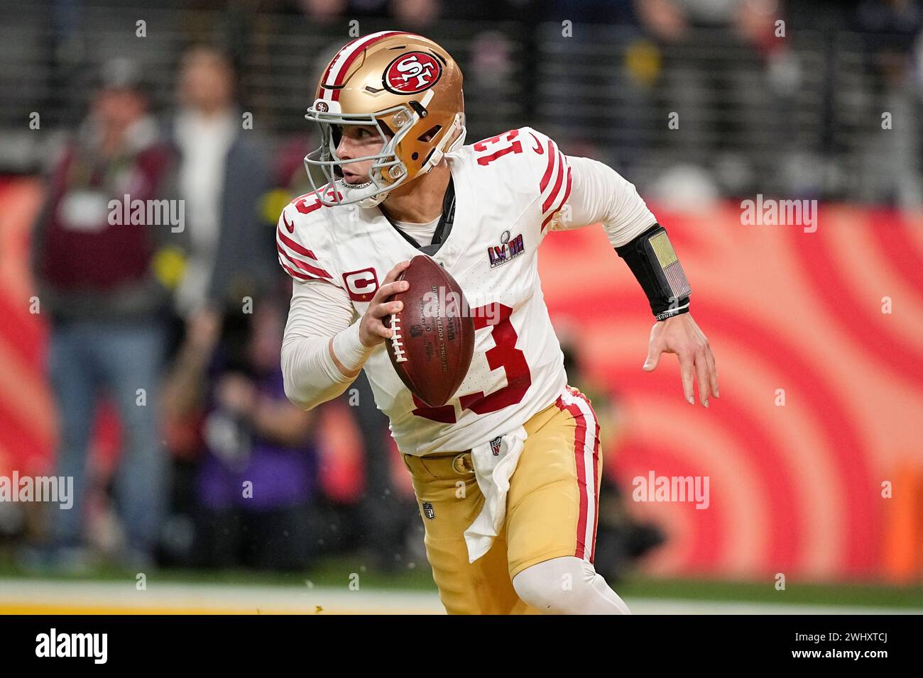 San Francisco 49ers quarterback Brock Purdy scrambles against the ...