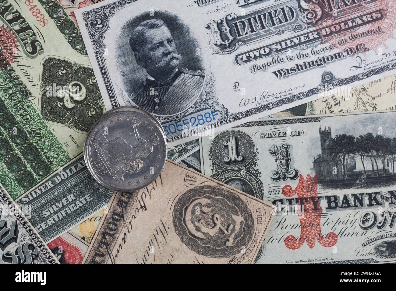 Old west period US banknotes and silver certificates with silver dollar ...