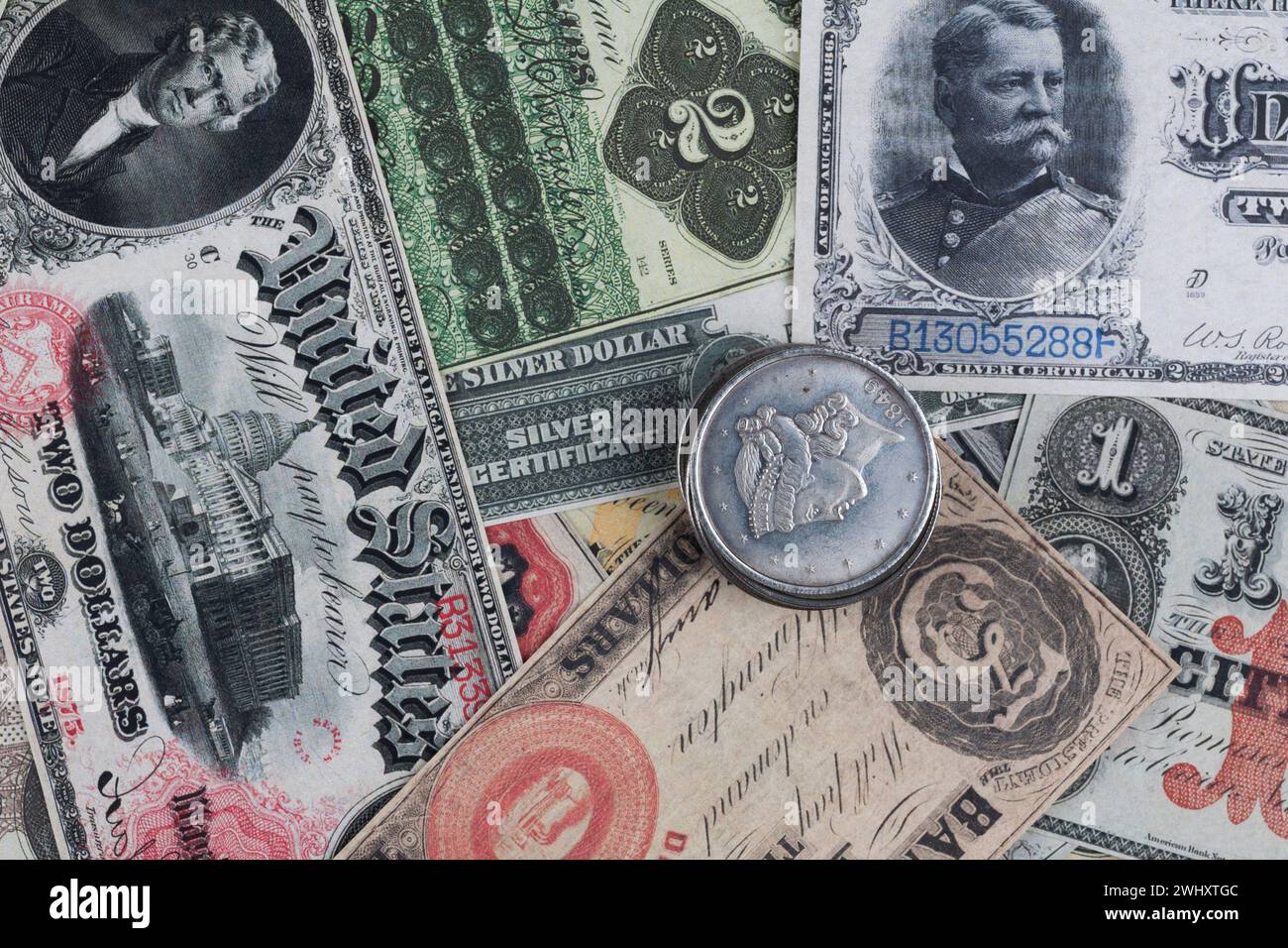 Old west period US banknotes and silver certificates with silver dollar ...