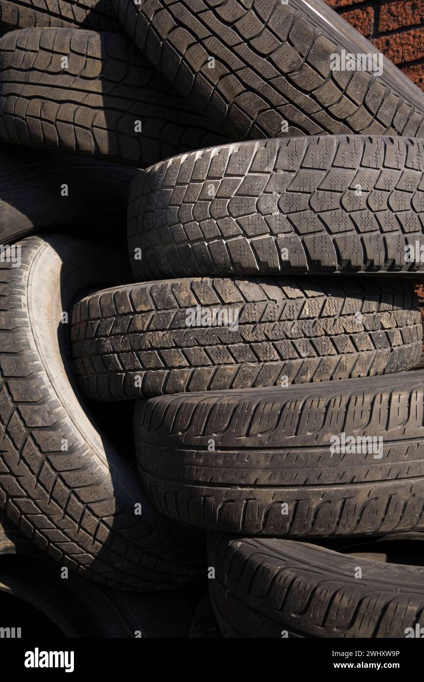 Pile of discarded motor vehicle rubber tires at recycling yard Stock ...