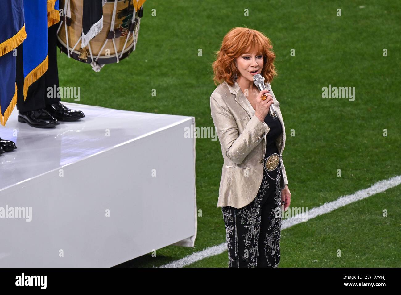 Las Vegas, USA. 11th Feb, 2024. Reba McEntire sings The National Anthem during the pre-game ...