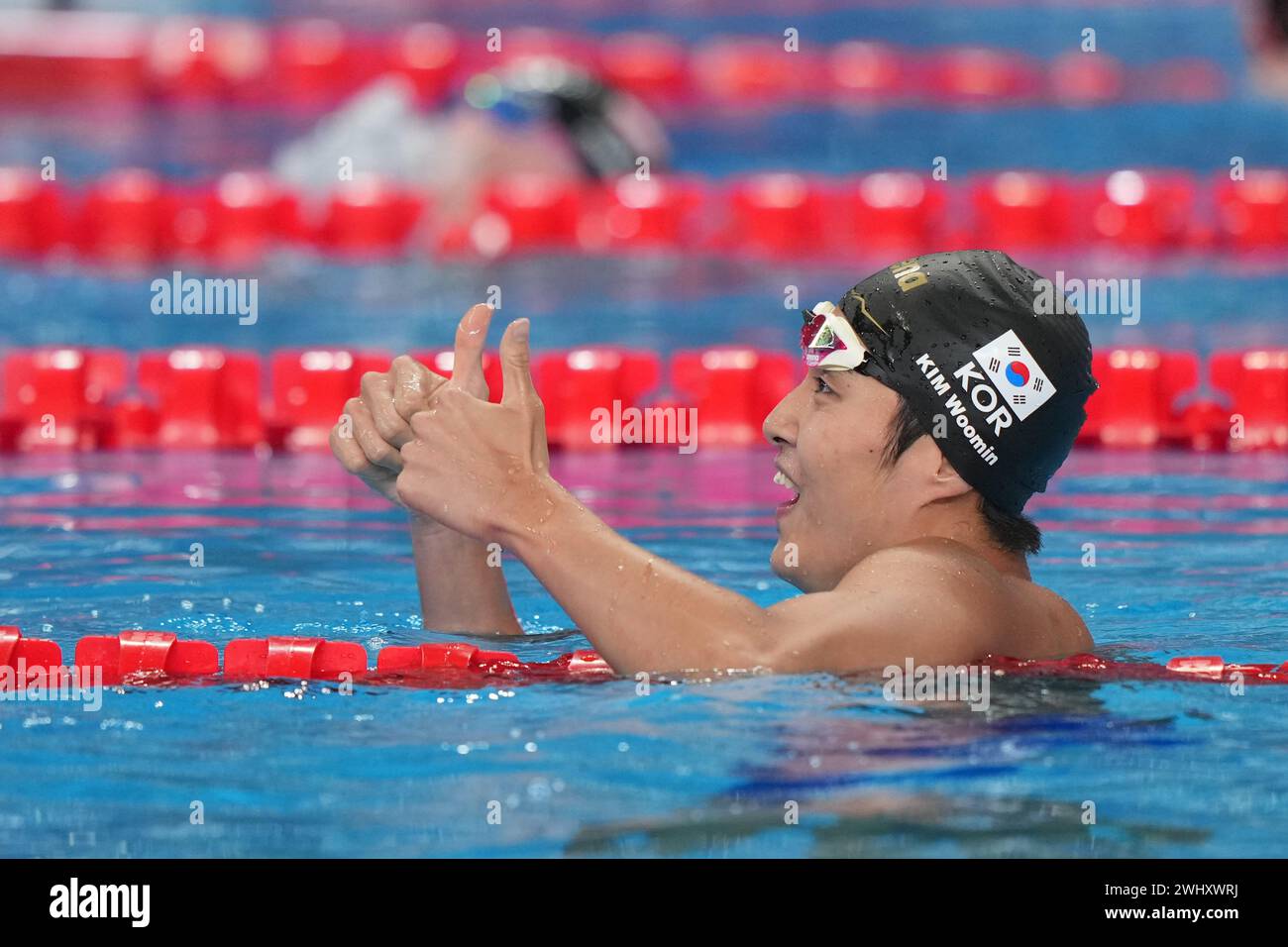 Doha, Qatar. 11th Feb, 2024. Kim Woo-min of South Korea celebrates ...