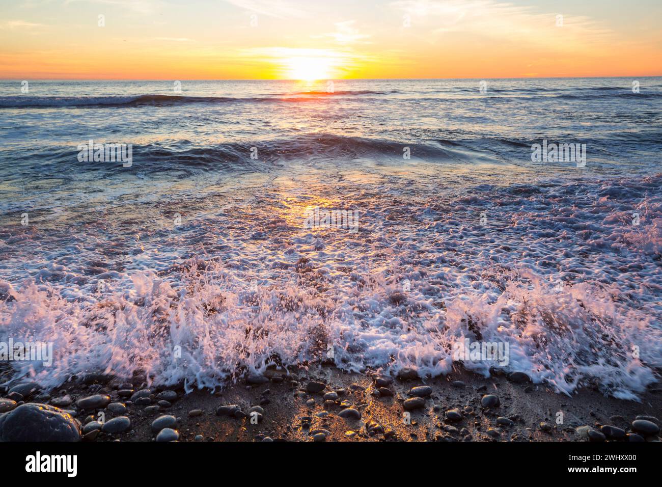 Blue wave on the beach. Dramatic natural background Stock Photo - Alamy
