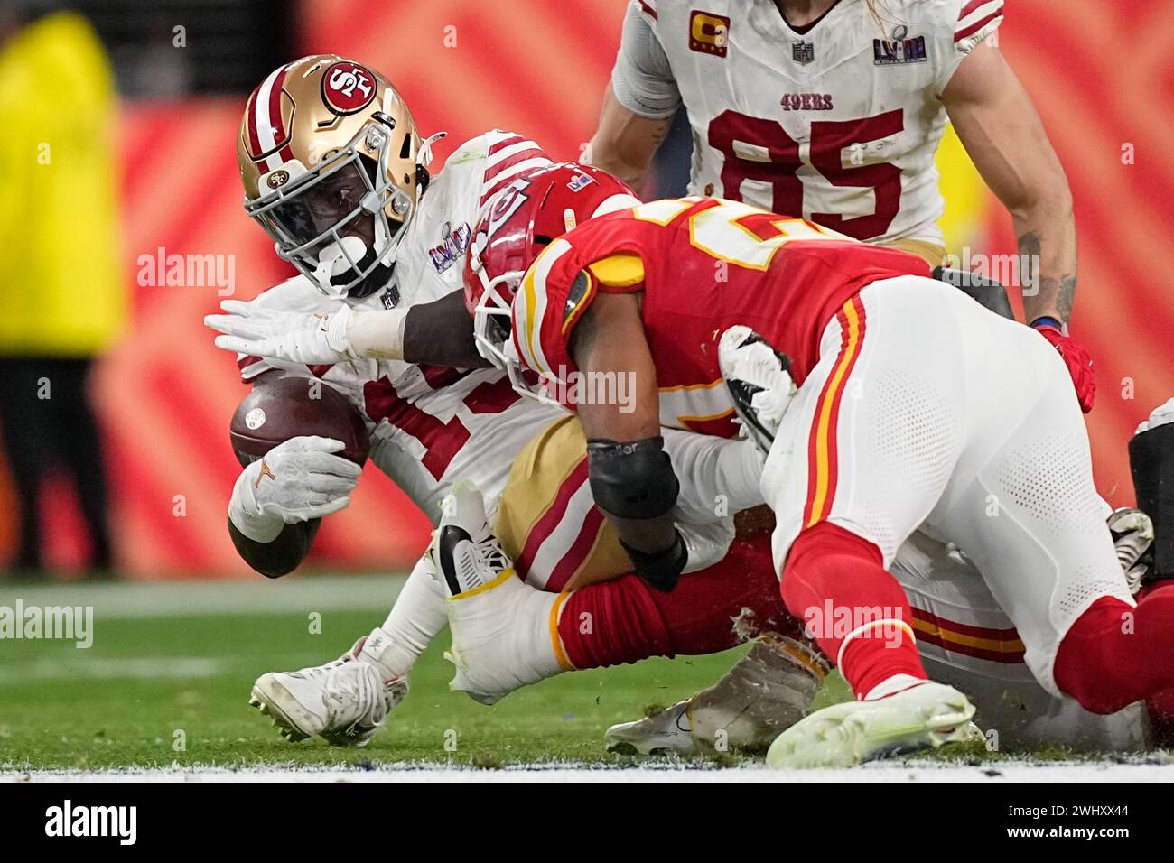 San Francisco 49ers wide receiver Deebo Samuel, left, is hit by Kansas ...
