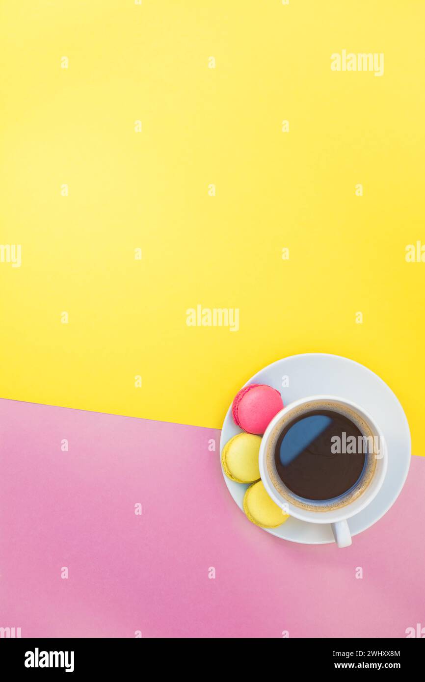Flat lay of coffee cup with macaroons Stock Photo - Alamy