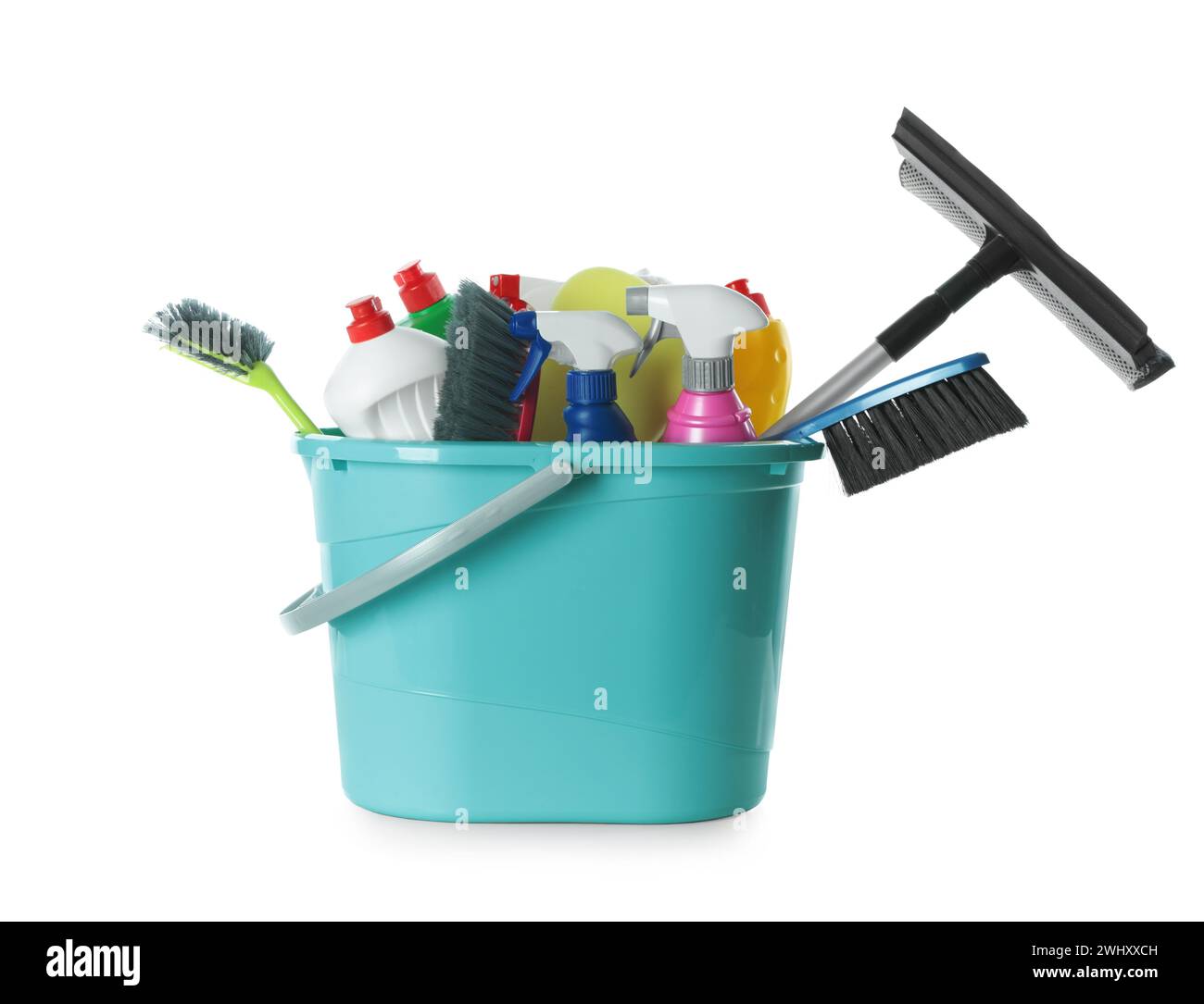 Plastic bucket with different cleaning supplies on white background ...