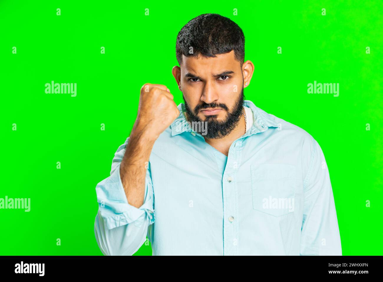 Aggressive angry Indian young man trying to fight at camera, shaking ...