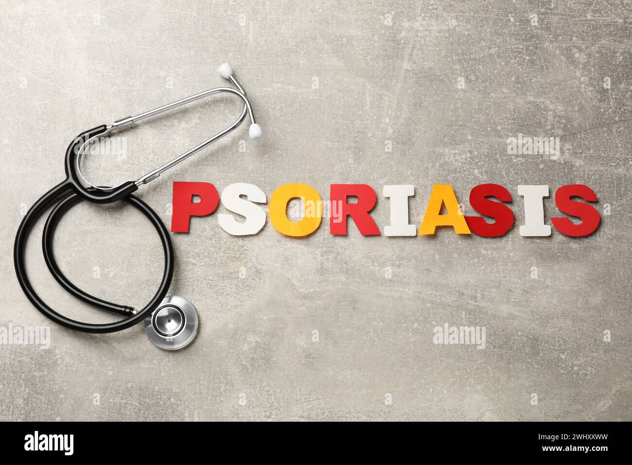 Word Psoriasis made of paper letters and stethoscope on light gray ...