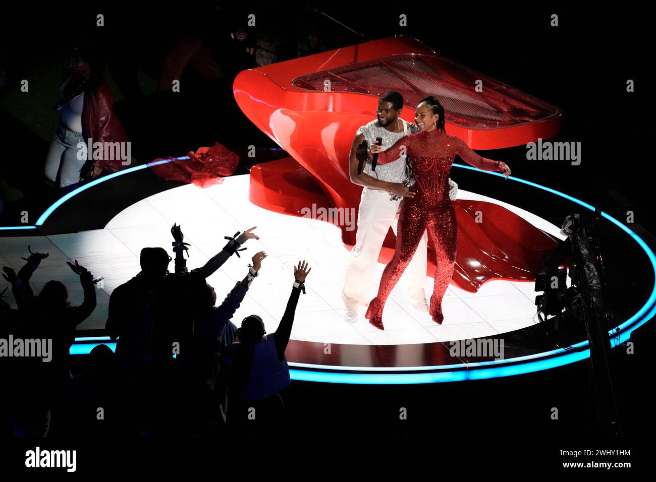 Usher and Alicia Keys perform during halftime of the NFL Super Bowl 58 ...