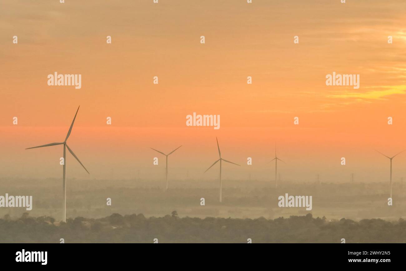 Landscape wind farm with sunrise sky. Sustainable renewable energy ...