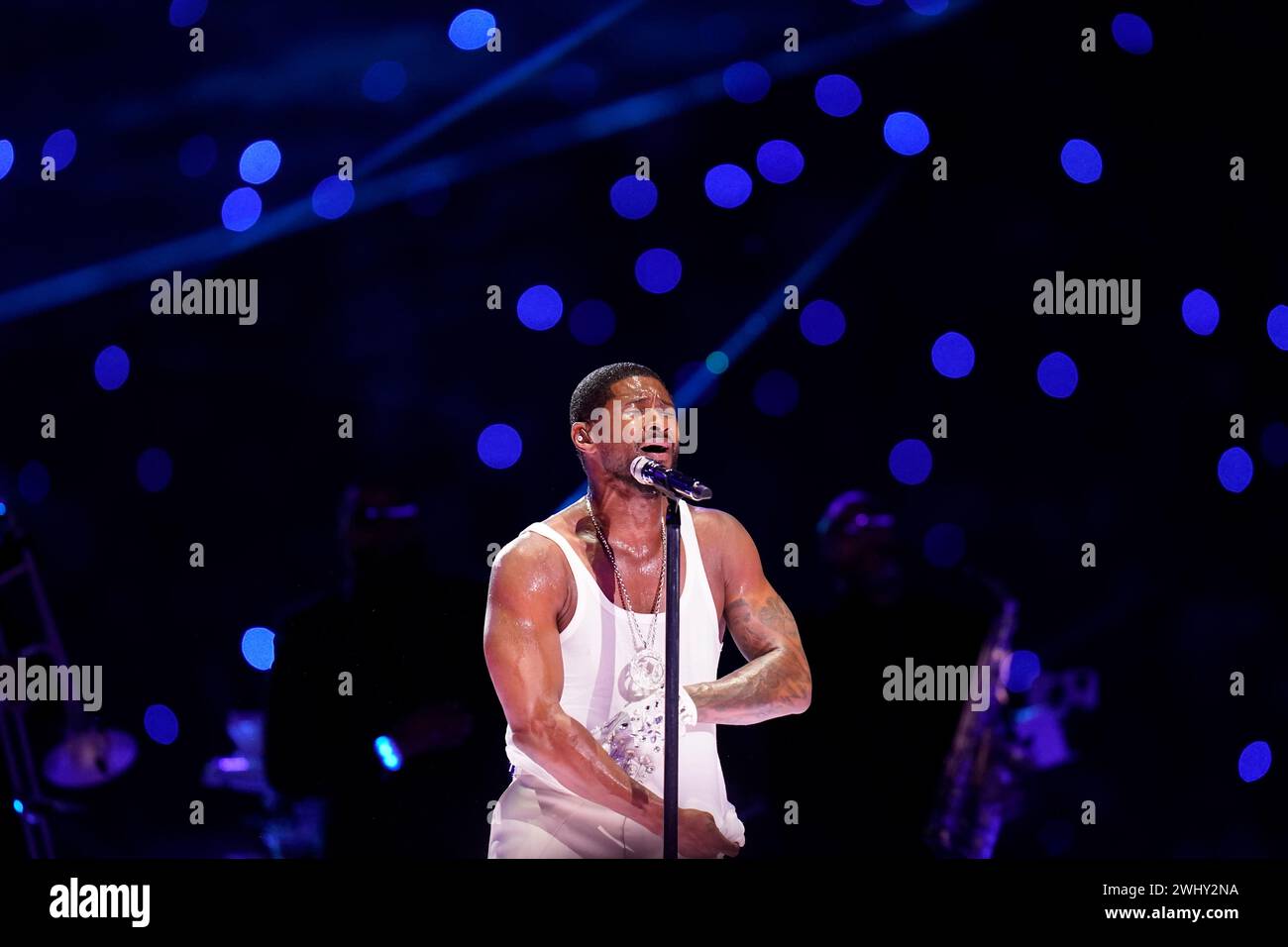 Usher performs during halftime of the NFL Super Bowl 58 football game ...