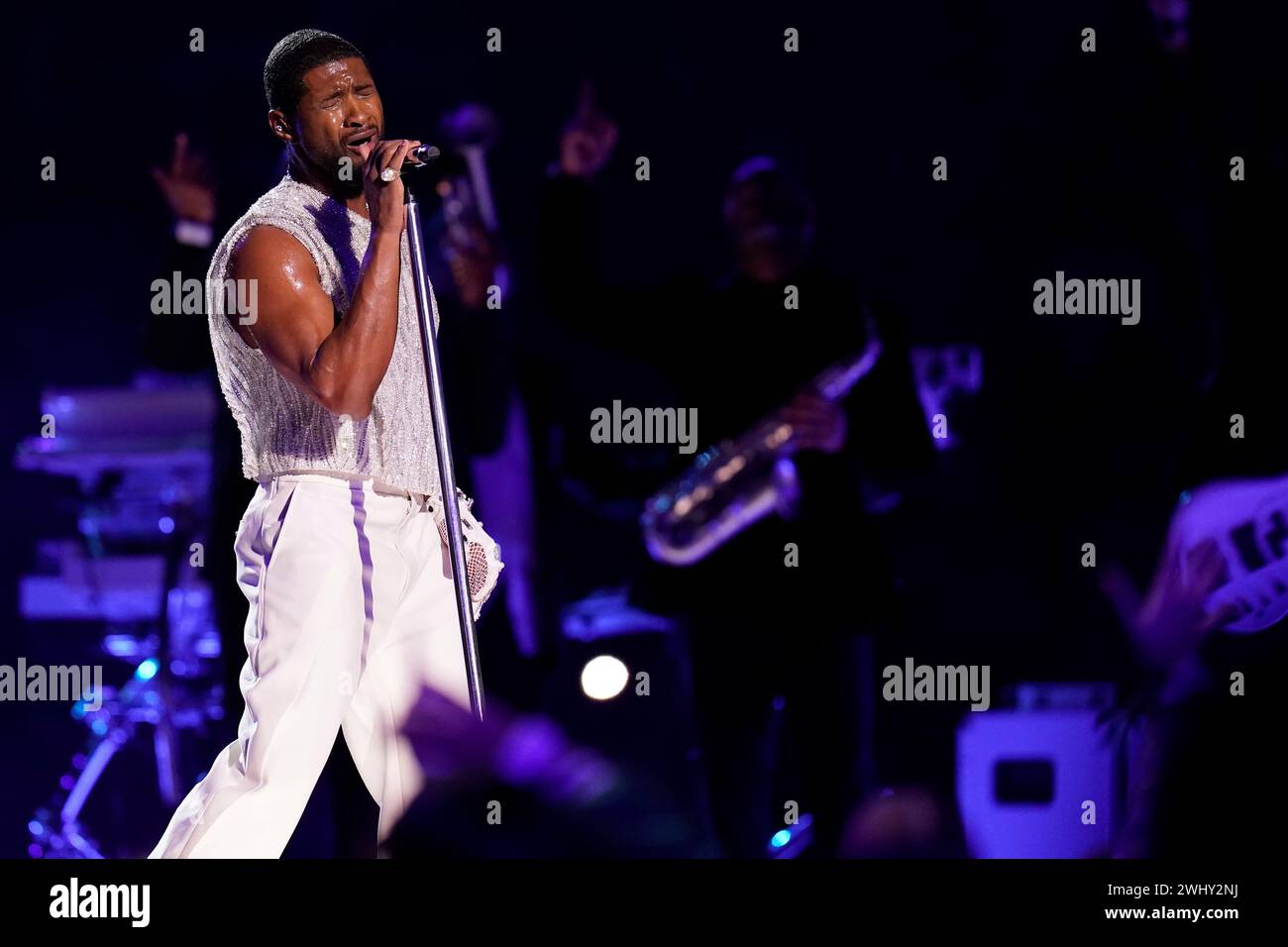 Usher performs during halftime of the NFL Super Bowl 58 football game ...