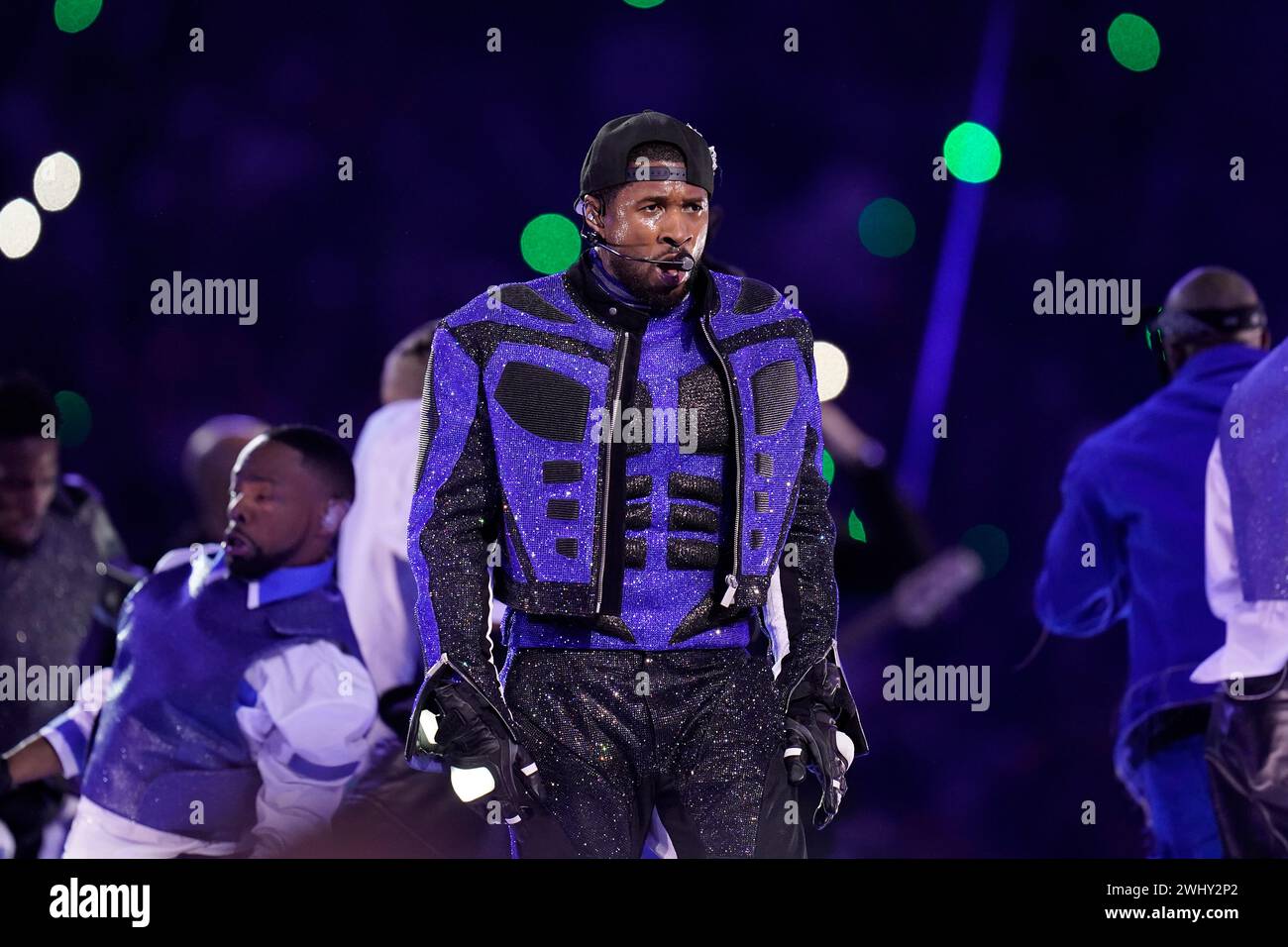 Usher performs during halftime of the NFL Super Bowl 58 football game ...