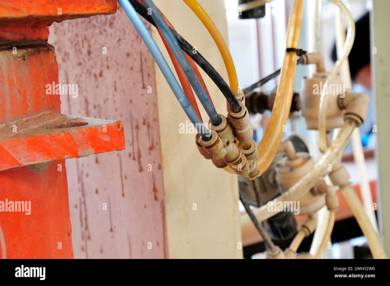 Shiny industrial equipment and piping, wiring and other connection ...