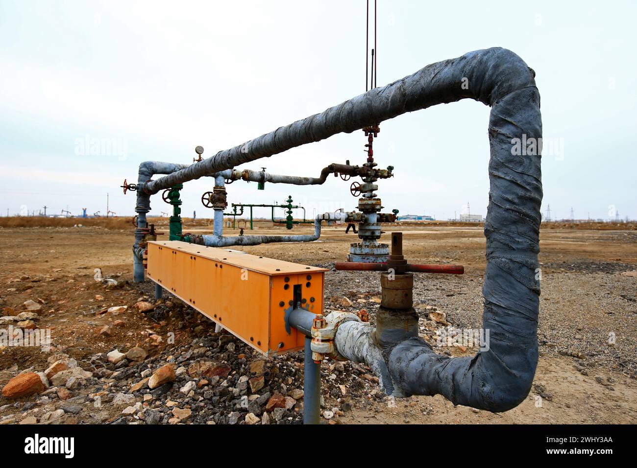 Oil pipes and valves Stock Photo - Alamy