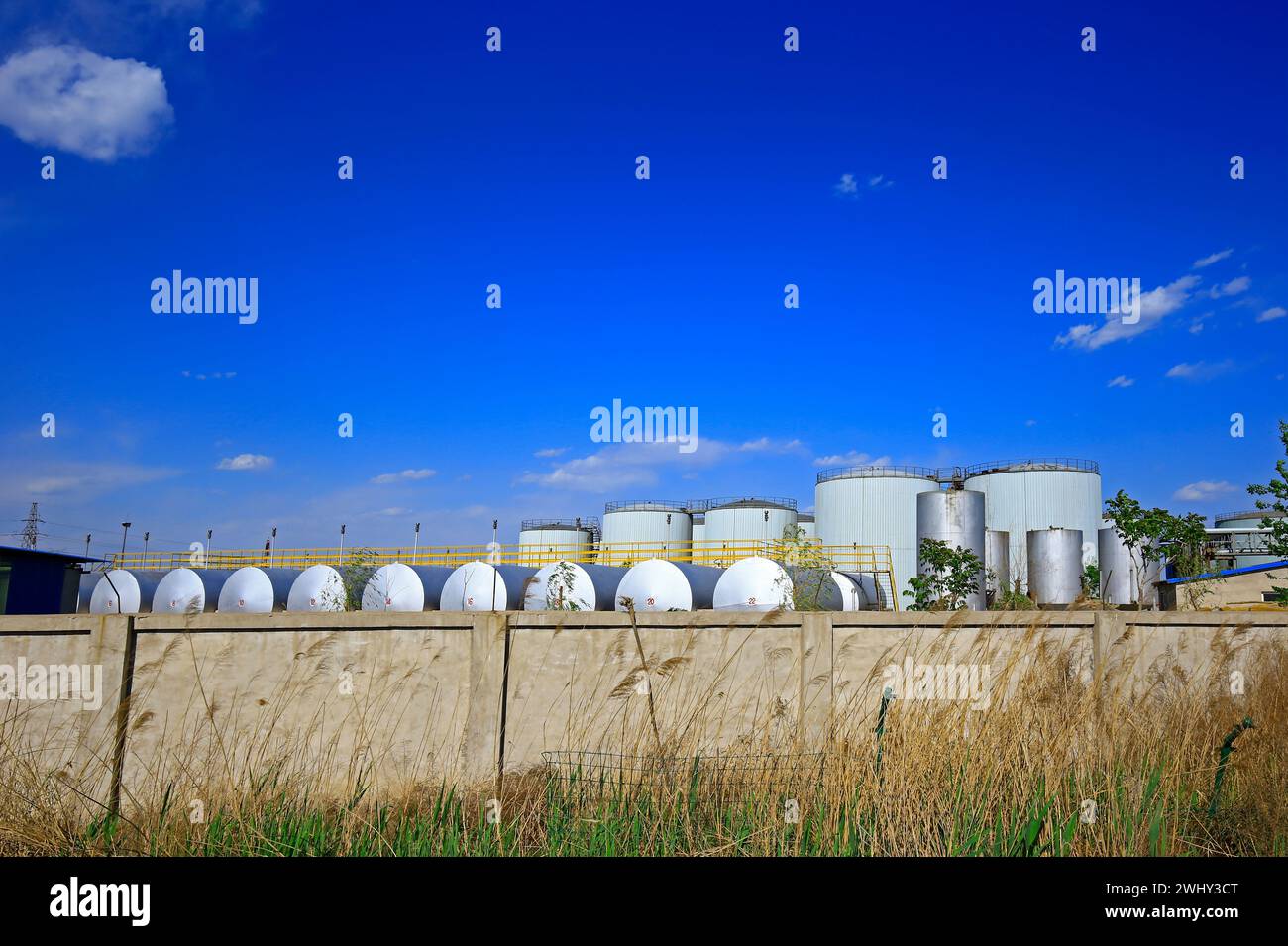 Oil storage tank, industrial equipment Stock Photo - Alamy
