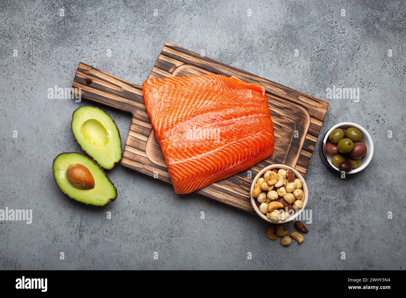 Food sources of healthy unsaturated fat: fresh raw salmon fillet ...