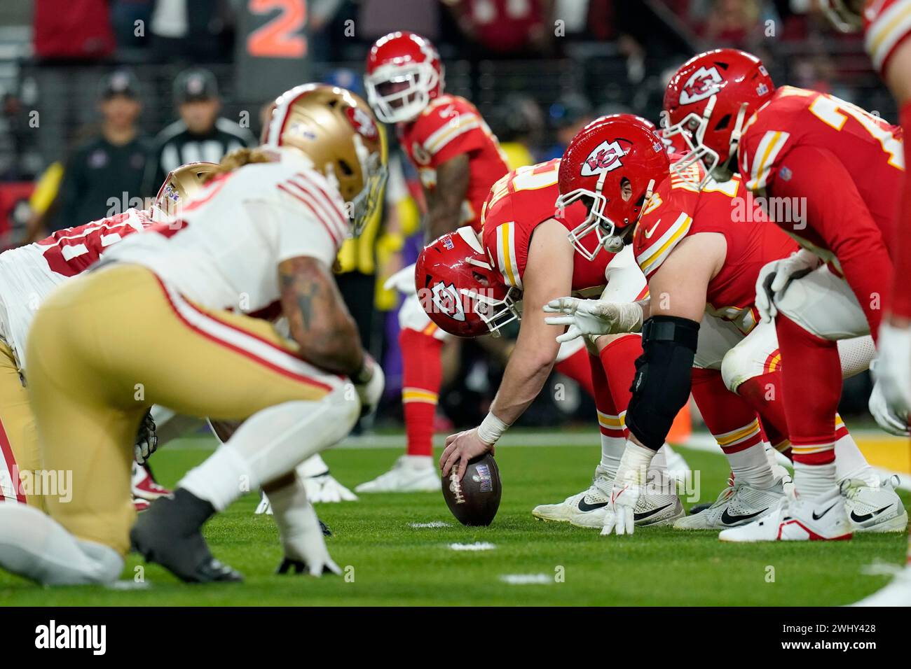 The Kansas City Chiefs and San Francisco 49ers are seen at the line of ...