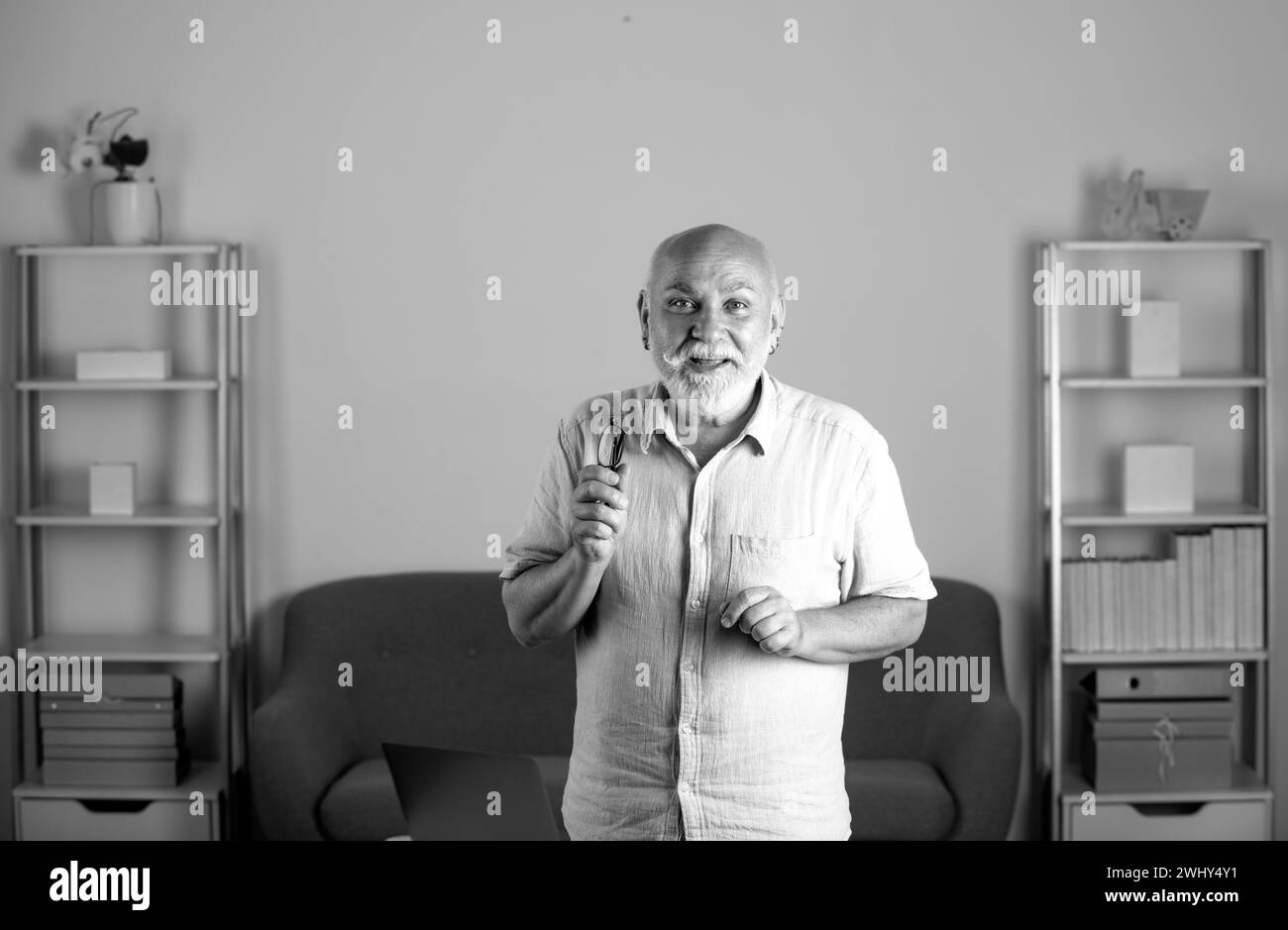 Senior social worker, psychologist. Mature consultant, senior man in ...