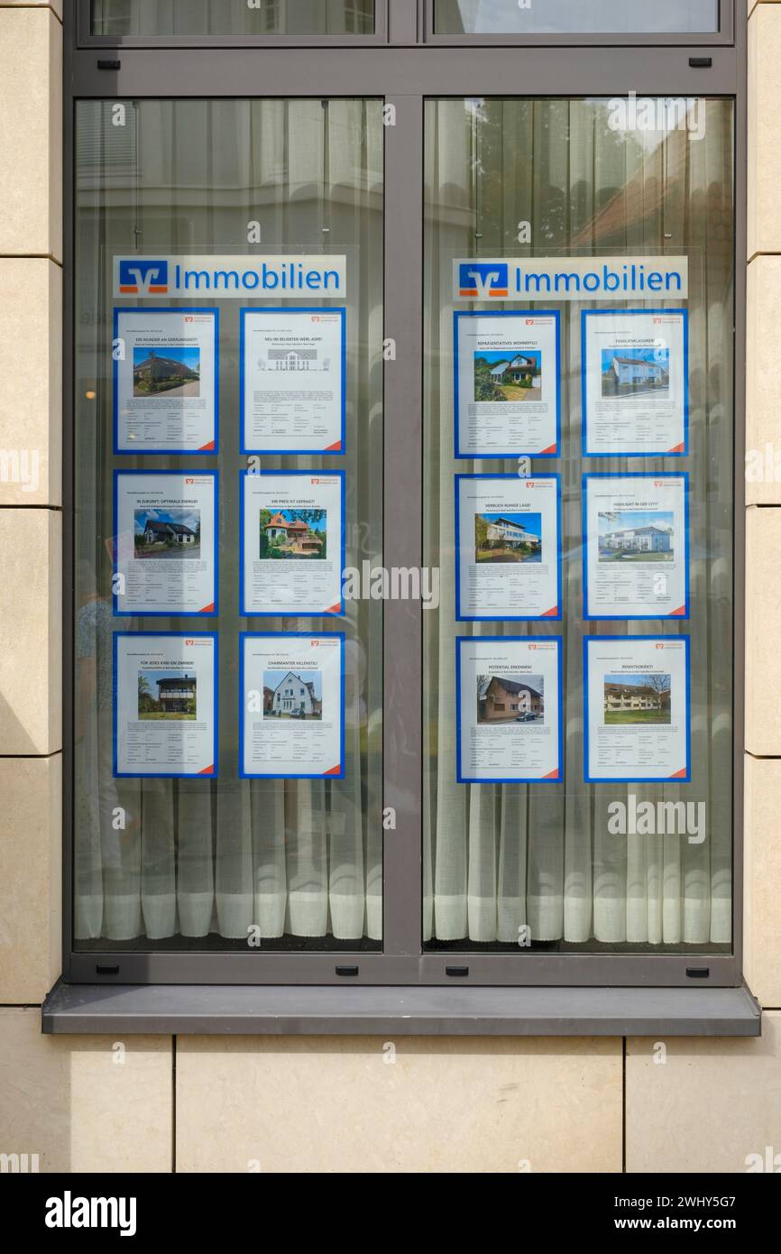 Window with placard of real property Stock Photo - Alamy