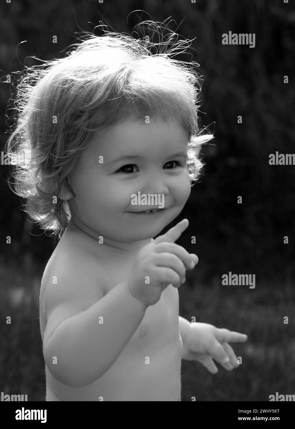 Portrait of little Baby with pointing finger. Concept of kids face ...