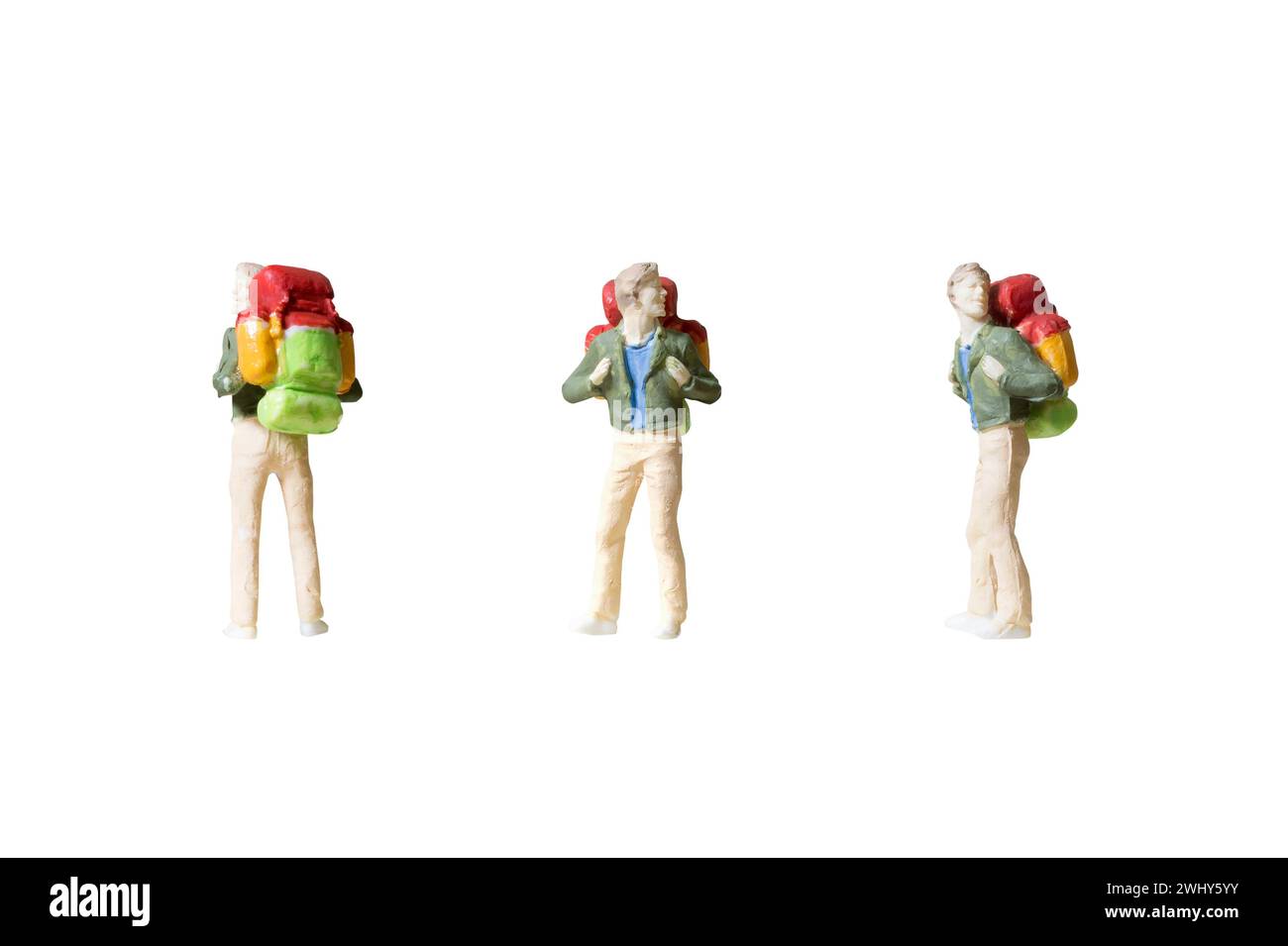 Miniature backpacker isolated on white background Stock Photo - Alamy