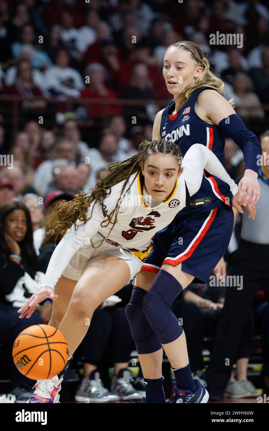 South Carolina guard Tessa Johnson, left, drives against UConn guard ...