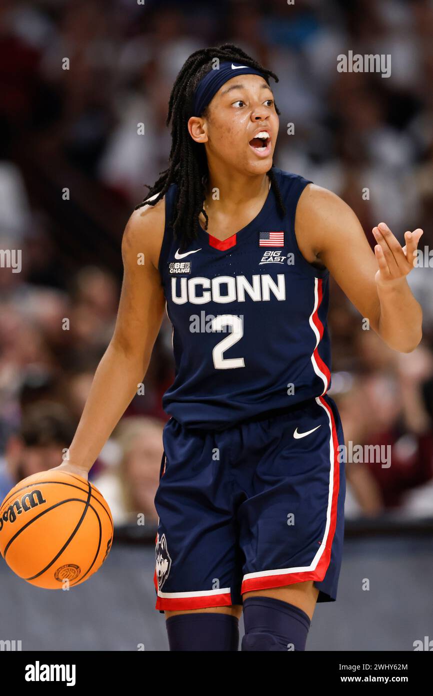 UConn guard KK Arnold brings the ball up court during the second half ...
