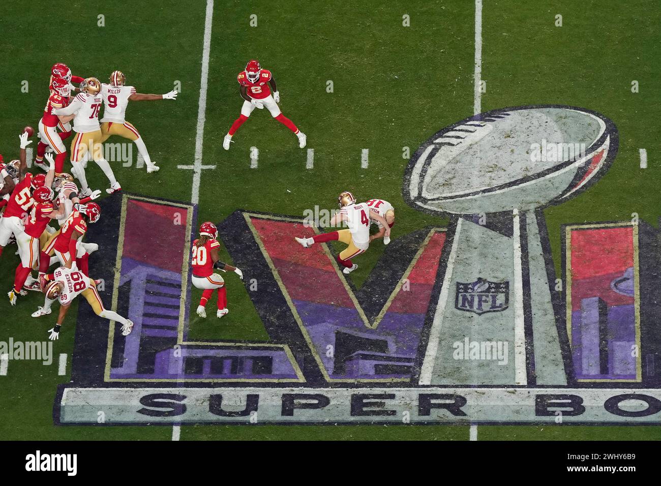 Kansas City Chiefs defensive end Mike Danna (51) blocks the extra-point ...