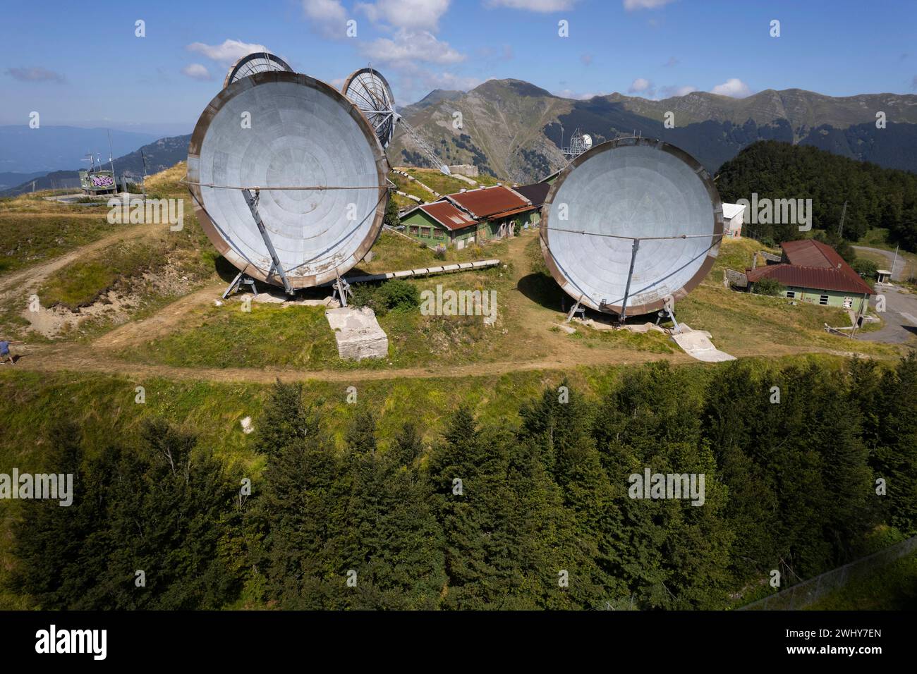 Old data transmission dishes in an abandoned base Stock Photo - Alamy