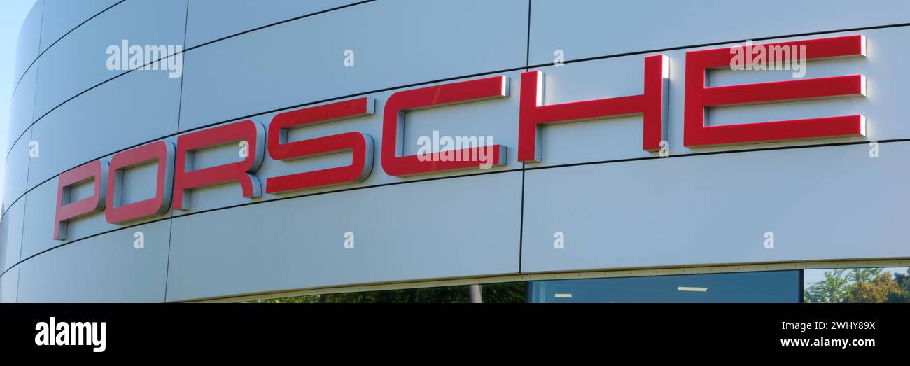 Writing Porsche at the Porsche center Essen Stock Photo - Alamy