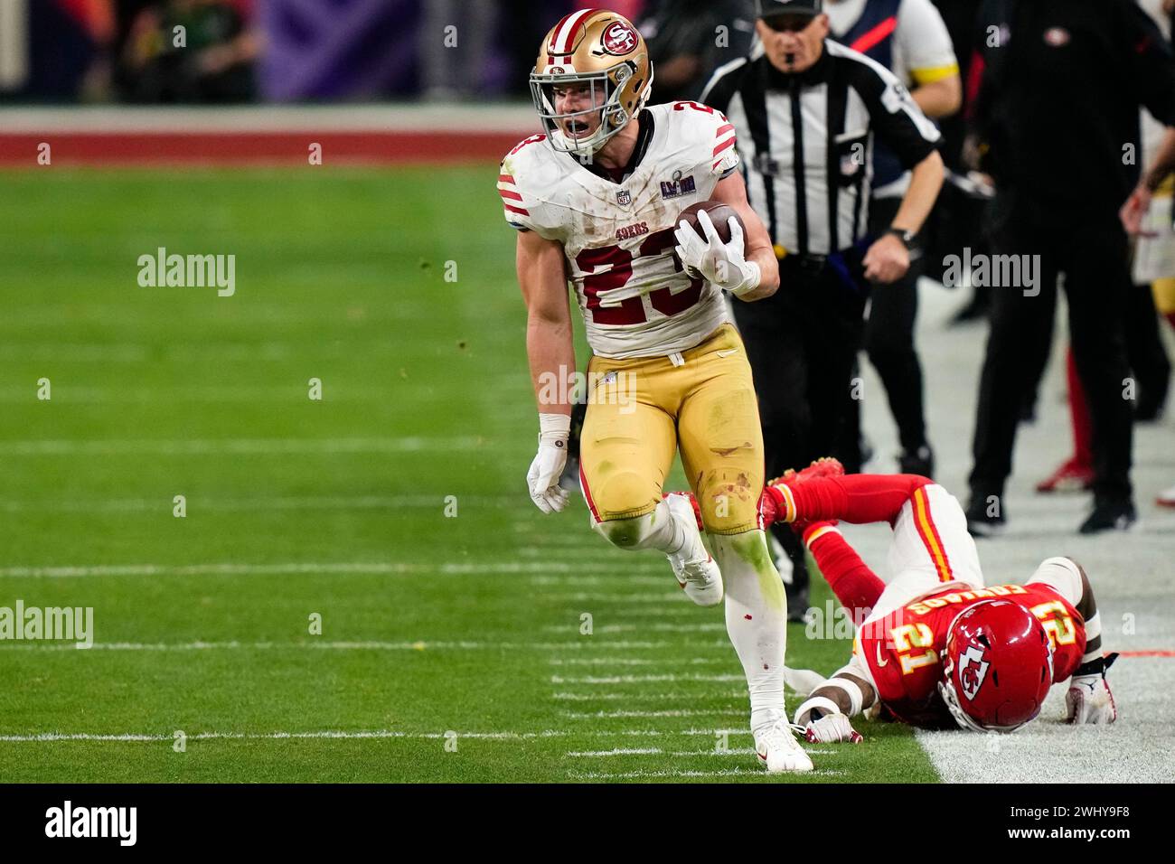 San Francisco 49ers running back Christian McCaffrey (23) runs past ...