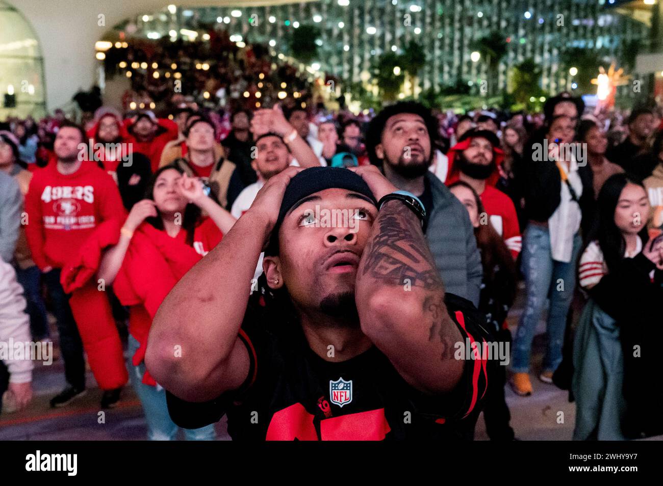 San Francisco 49ers fans react during overtime play while watching a ...