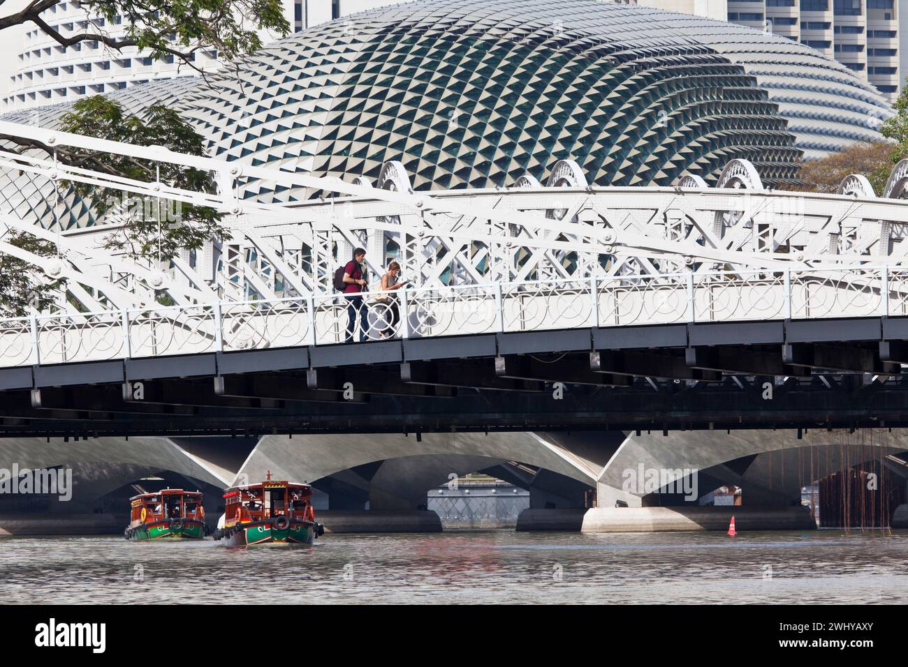 Traditional 'bumboat' ferries passing under Anderson Bridge (c 1910 ...