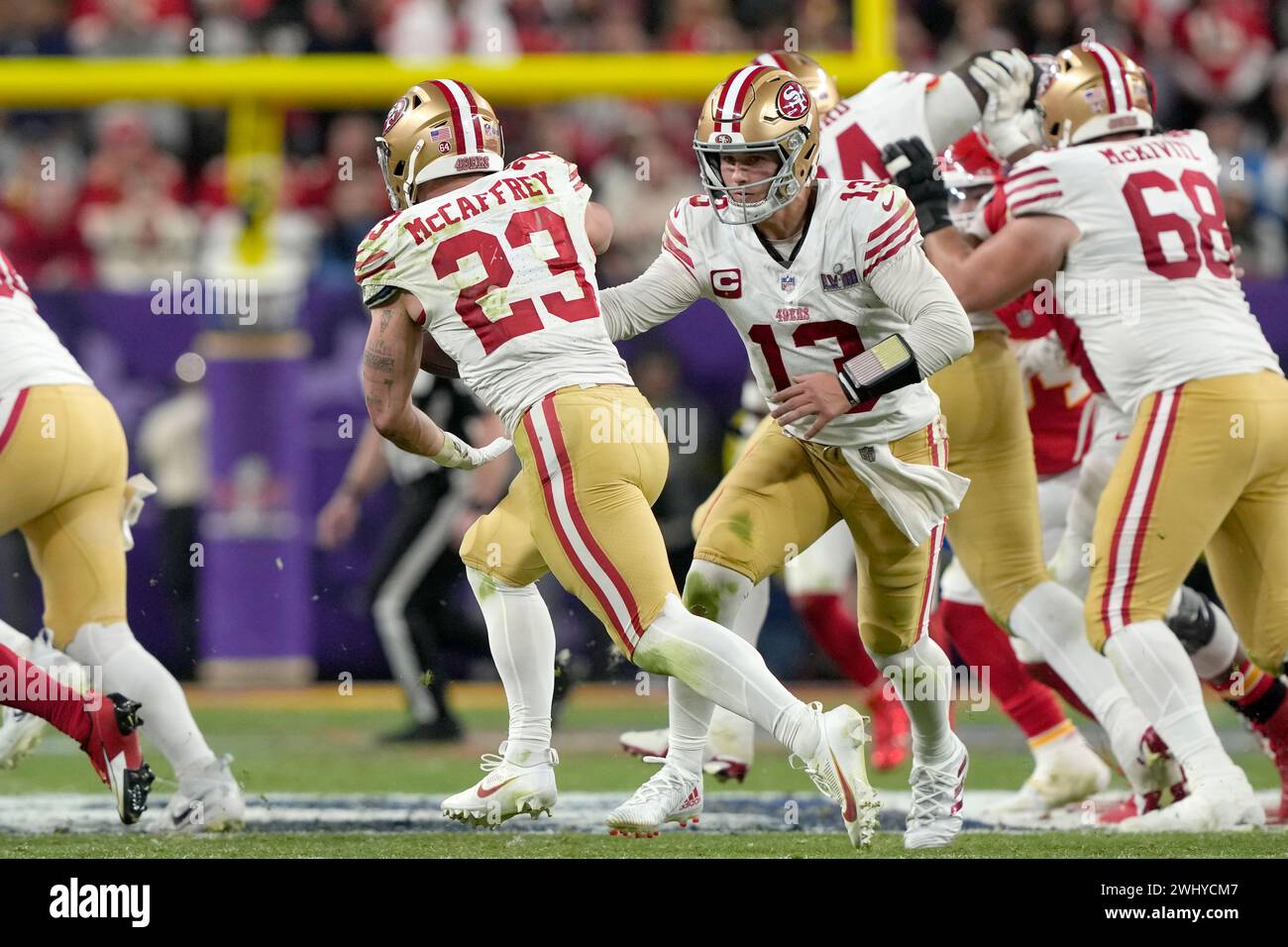 San Francisco 49ers running back Christian McCaffrey (23) recieves a ...