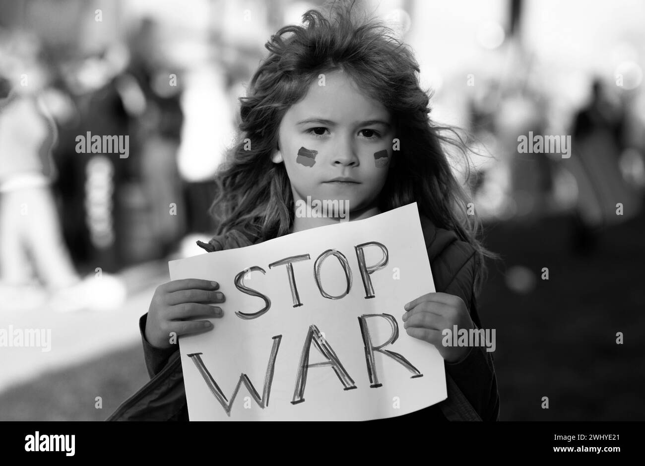 Portrait of kids holding board Stop war in Ukraine, poster with Stop ...