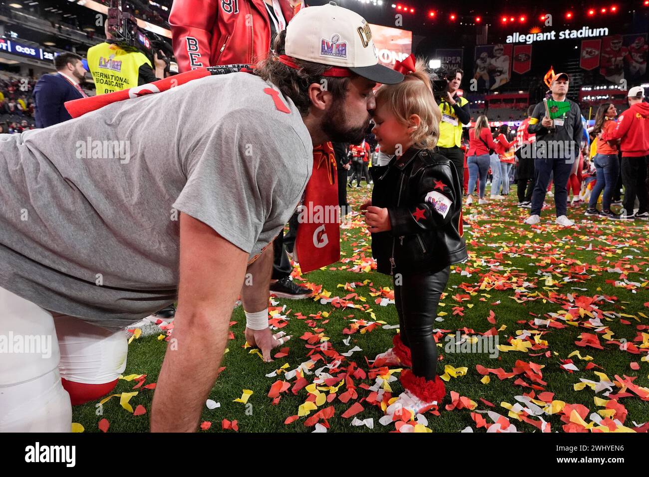 Kansas City Chiefs tight end Blake Bell (81) kisses a child after the ...