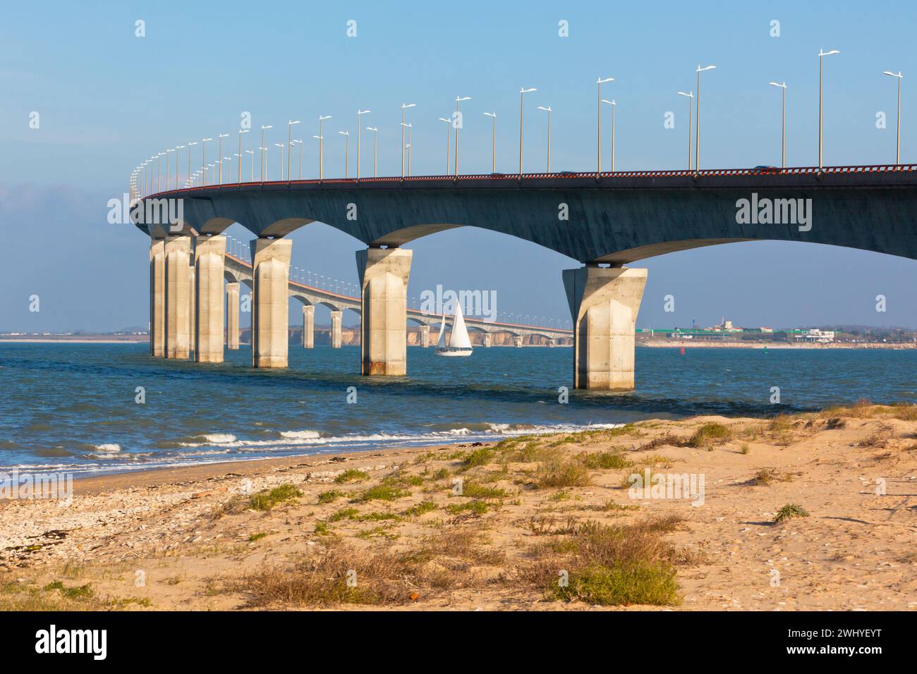 Curved Concrete Bridge over the water Stock Photo - Alamy