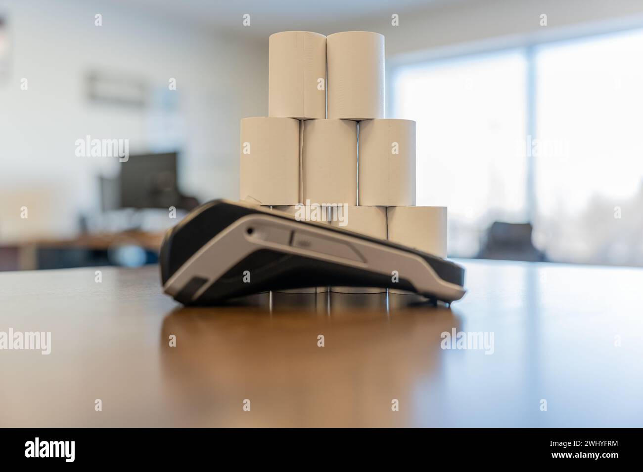 POS Machine with stack of Thermal Rolls - Payment Processing Stock ...