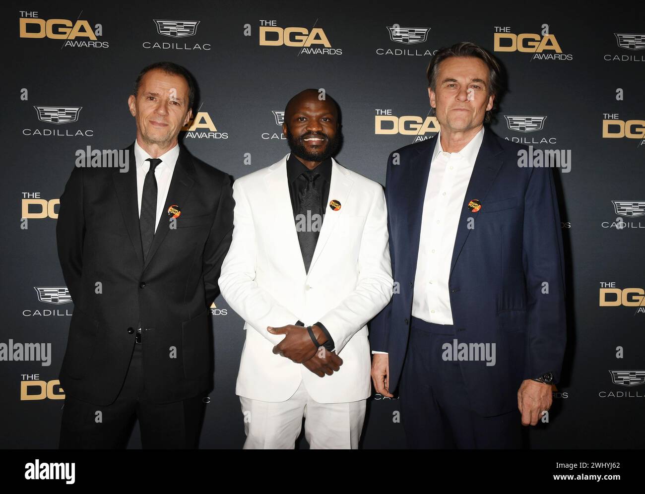 Beverly Hills, California, USA. 10th Feb, 2024. (L-R) John Battsek, Moses Bwayo and Christopher ...