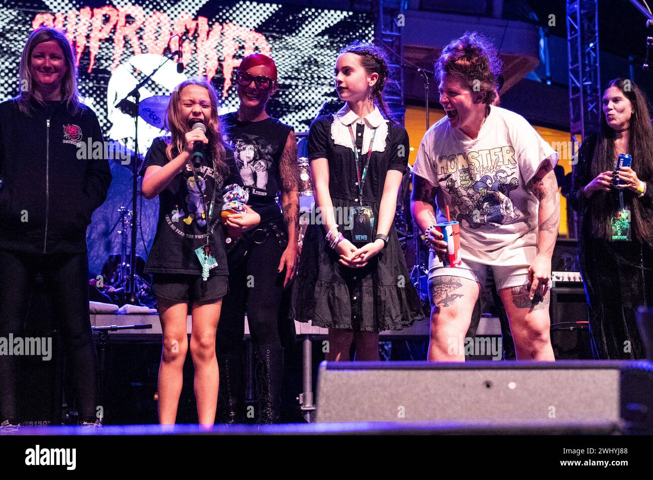 Festivalgoers are seen during the Scream Queen Contest on board the ...
