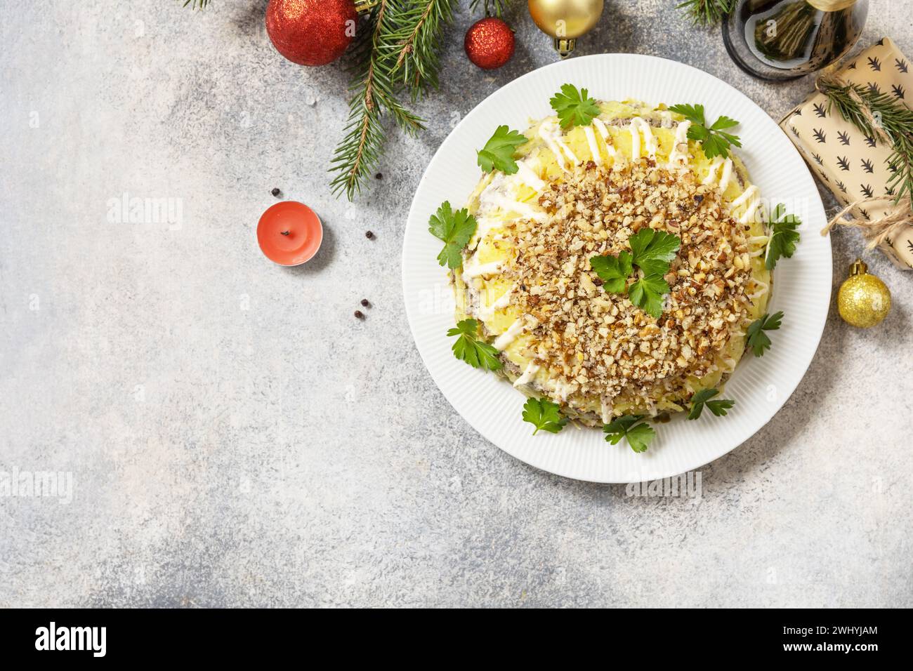 Christmas appetizer. Christmas New Year salad with potatoes, liver and ...