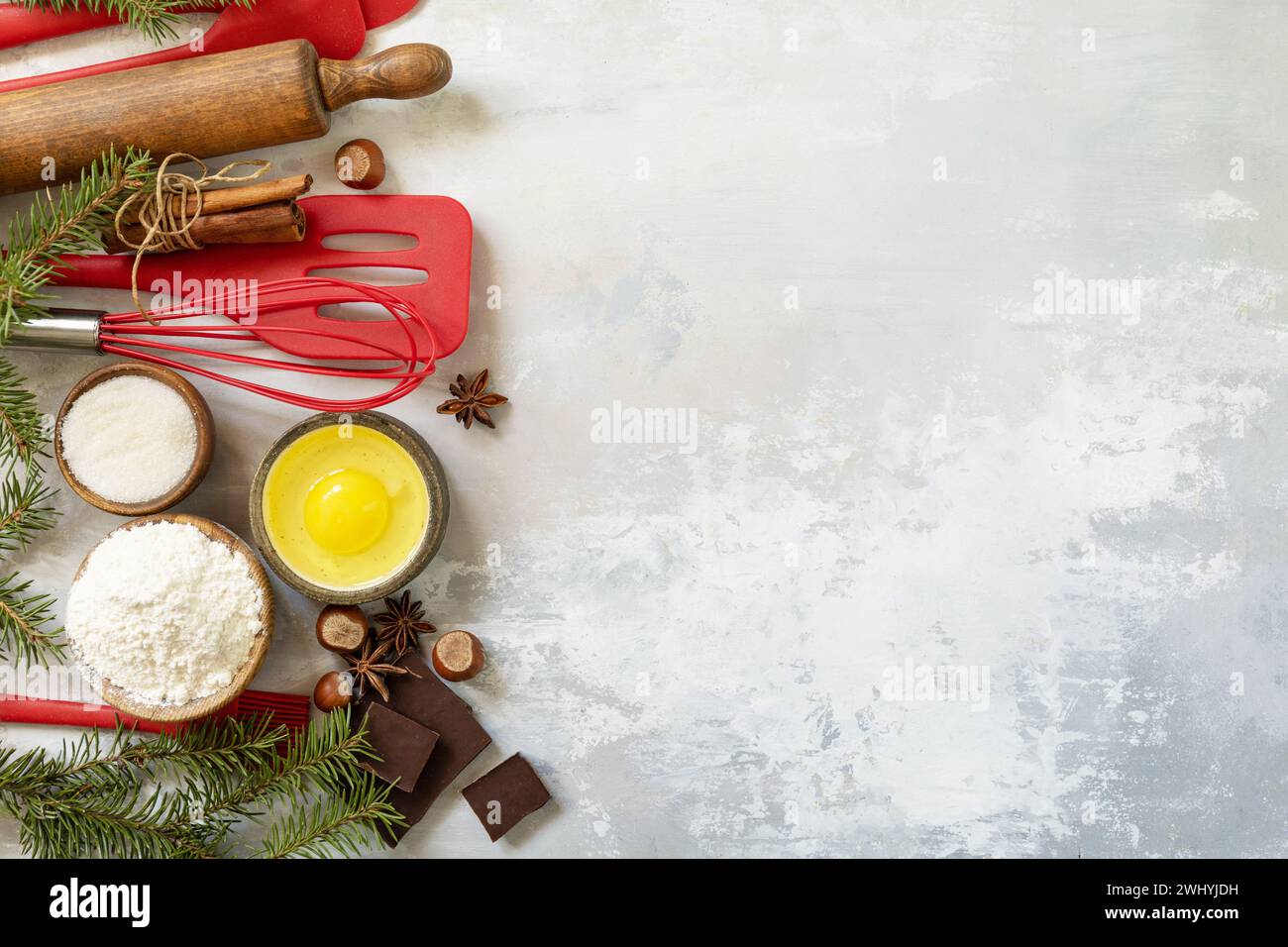 Christmas baking background with fir tree made from kitchen utensils ...