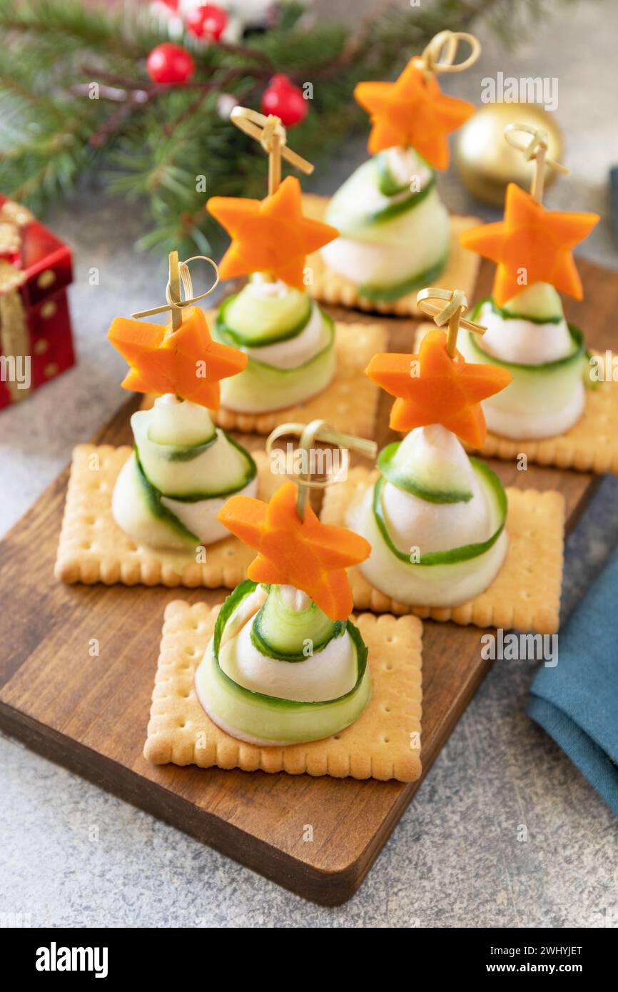 Creative appetizers christmas. Christmas trees of ham, cucumber, cheese ...
